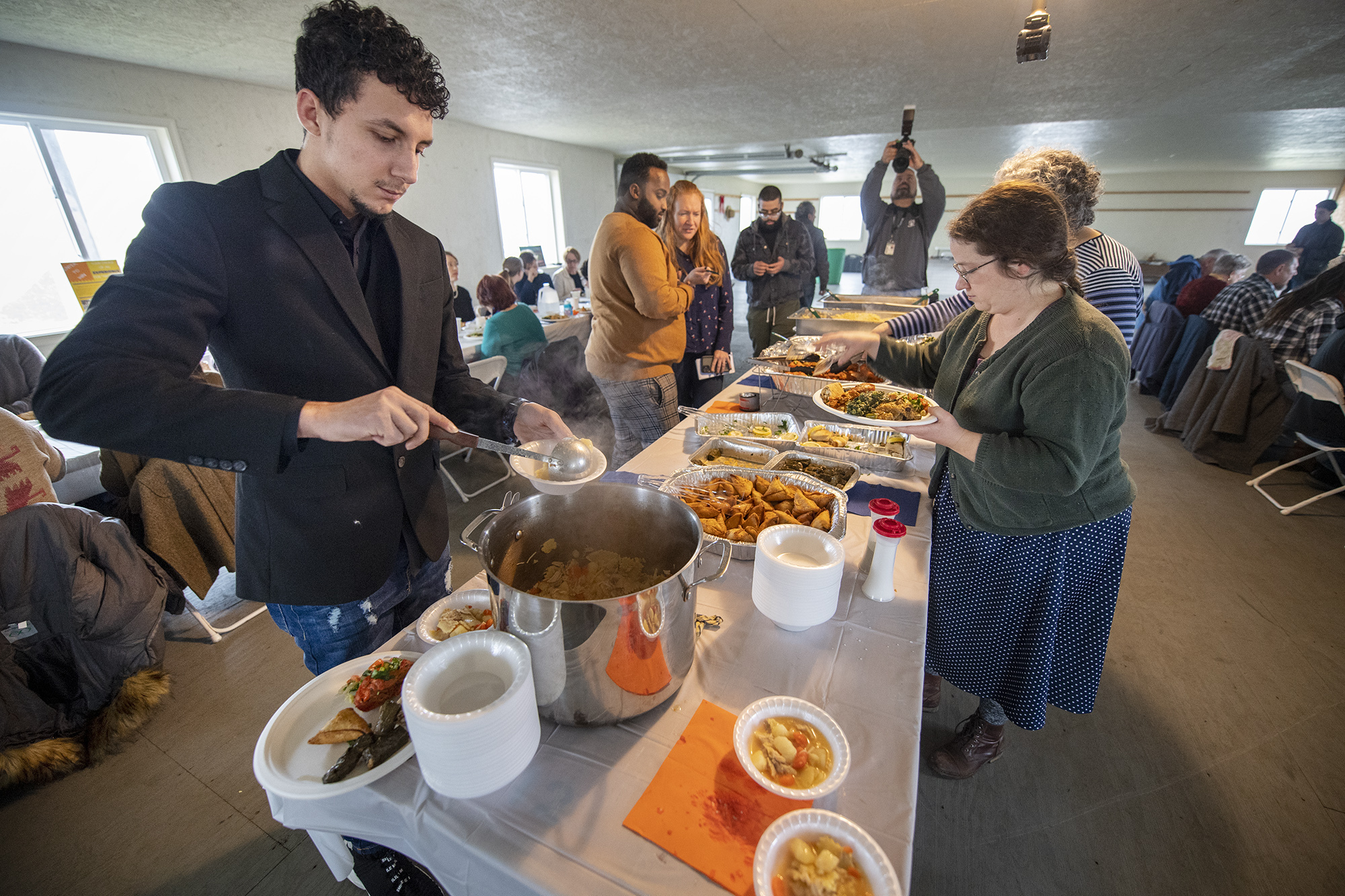 Breaking bread with Amish, refugee families | News, Sports, Jobs - The ...